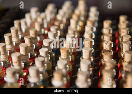 Several small essence bottles with cork Stock Photo - Alamy
