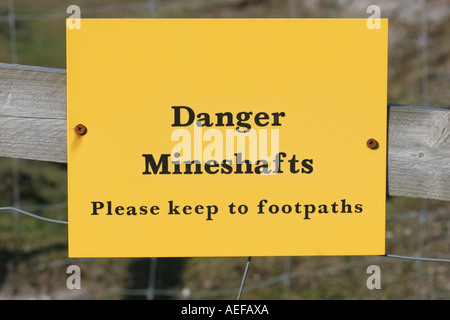 Danger Mine Shaft Sign on Fence Protecting Mineshaft Collapse Minions ...