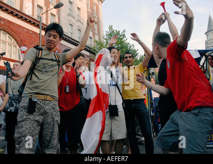 Fans cheer after the World Cup Group J soccer match between Argentina ...