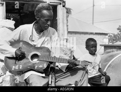 Somali Guitar man Stock Photo - Alamy