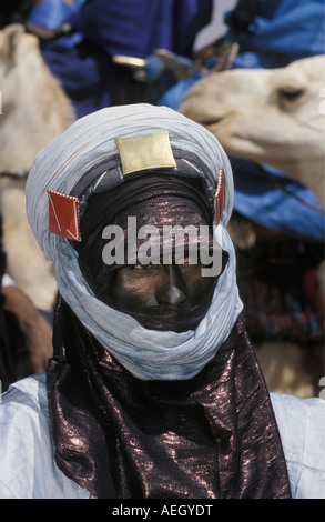 Mali Menaka near Gao, Men of Tuareg tribe sitting on camels Stock Photo ...