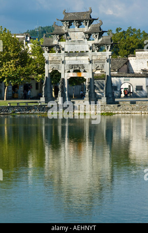 Traditional Chinese style architecture with paifang arch gateway at ...