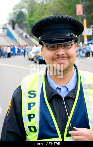 1, one, Mexican policeman police officer on duty making eye contact in ...