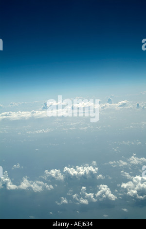 Sky above clouds from airplane window Stock Photo - Alamy