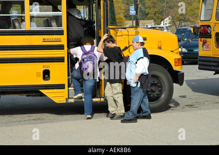 School busses in line to pick up students at the end of the school ...