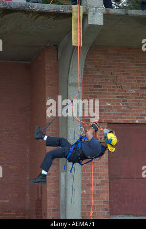 Fire fighters practice the art of repelling Stock Photo - Alamy