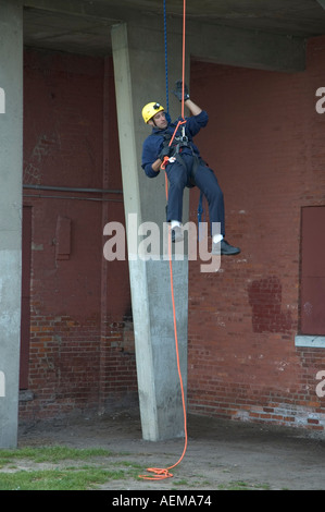Fire fighters practice the art of repelling Stock Photo - Alamy