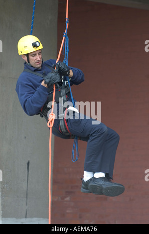 Fire fighters practice the art of repelling Stock Photo - Alamy
