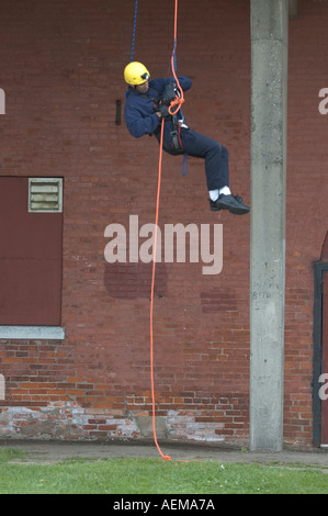 Fire fighters practice the art of repelling Stock Photo - Alamy