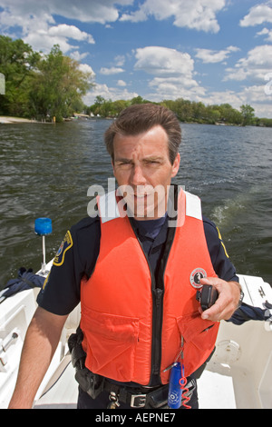 Police Officer on Wolverine Lake Stock Photo - Alamy