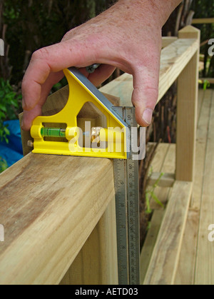 builder marking spirit level measurement Stock Photo - Alamy