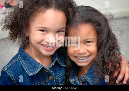Twin Sisters who look alike dress alike and act alike as twins at the ...