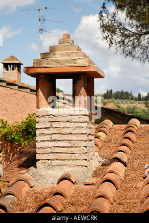 Classic iconic Tuscany farm house sits on hill top with rolling golden ...