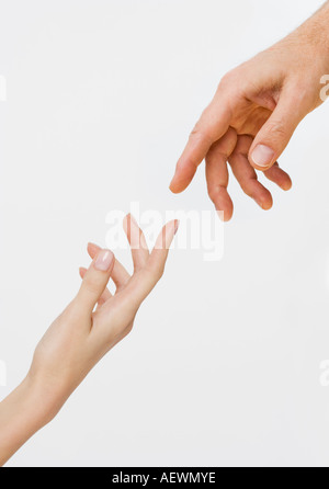 Two hands touching Stock Photo - Alamy