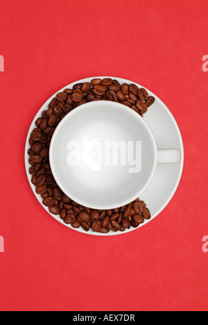 Coffee cup and beans above Stock Photo - Alamy