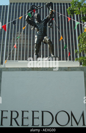 Lusaka, Zambia; 'Freedom'; statue of slave breaking his chains with ...