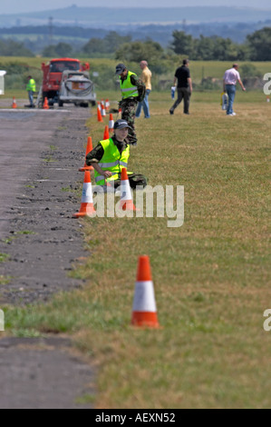 Cadets marshalling aircraft at the PFA Rally Stock Photo - Alamy