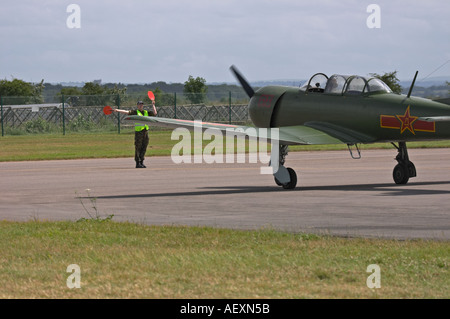 Cadets marshalling aircraft at the PFA Rally Stock Photo - Alamy