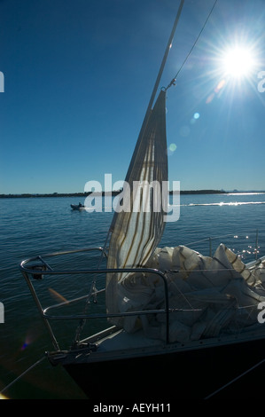 furled foresail on yacht Stock Photo - Alamy