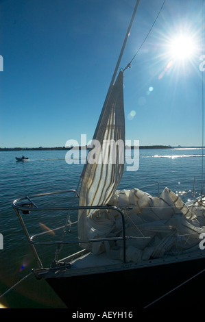 furled foresail on yacht Stock Photo - Alamy
