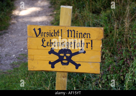 a minefield warning sign written in german Stock Photo - Alamy