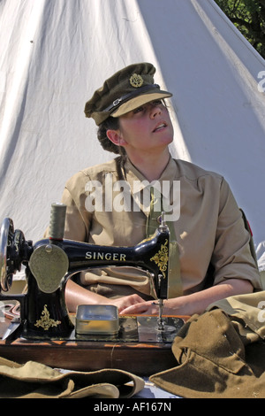 A WW2 Reenactment female member wearing the uniform of an ATS Corporal ...