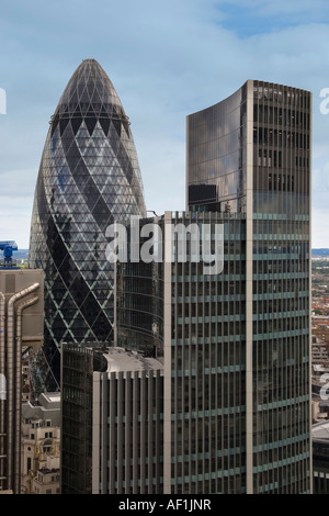 a close up aerial view of the Gherkin and Tower 42 buildings in the ...