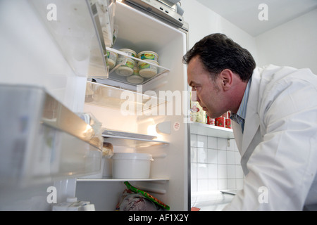 Food quality control Inspector checks the quality in the fruit and ...