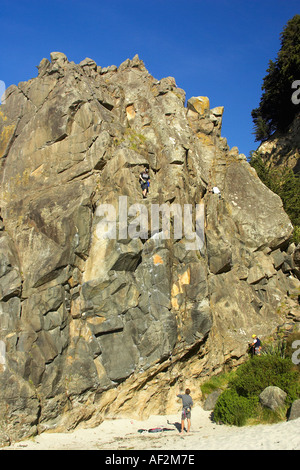 Rock Climbing Long Beach near Dunedin South Island New Zealand Stock ...