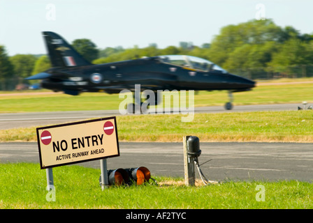 No Entry Active Runway Ahead sign with flashing amber lights at ...