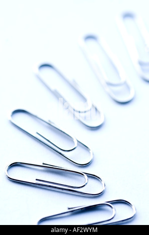 Clips on white paper Stock Photo - Alamy
