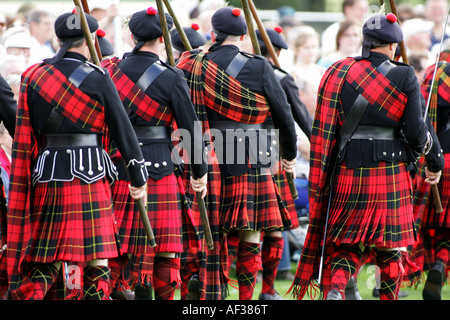 Men of the Lonach Highlanders march towards the Lonach Gathering at ...