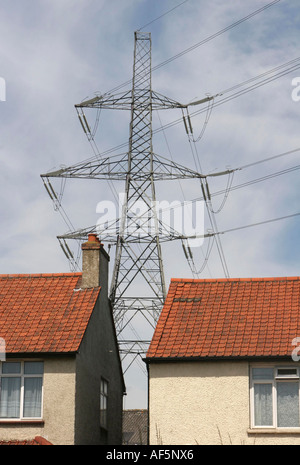 A electricity pylon near houses Stock Photo: 139098484 - Alamy