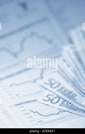Euro notes and financial graphs Stock Photo - Alamy