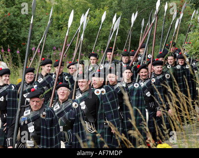 Men of the Lonach Highlanders march towards the Lonach Gathering at ...