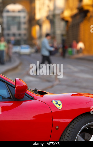 A Ferrari on street in Milan Stock Photo - Alamy