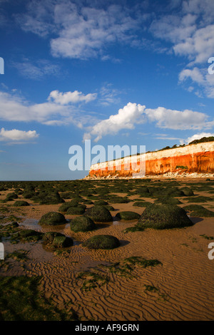 Sunny day Hunstanton beach cliffs reflections water Stock Photo - Alamy