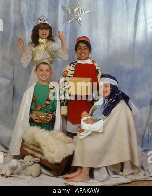 Nativity play with children acting as Mary and Joseph. Thailand S. E ...