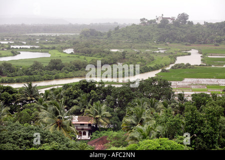 Batim village and background of prawn farms during monsoon used as salt ...