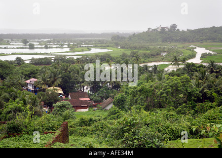 Batim village and background of prawn farms during monsoon used as salt ...