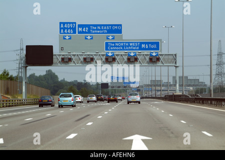 M6 motorway near Birmingham central England UK. Road signs for the ...