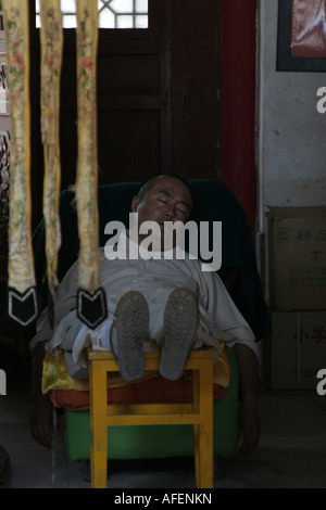 Chinese monk sleeping in in buddhist temple, temple garden, Wutai Shan ...