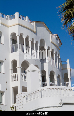 Multi story condos near beach in Nerja Spain Stock Photo - Alamy