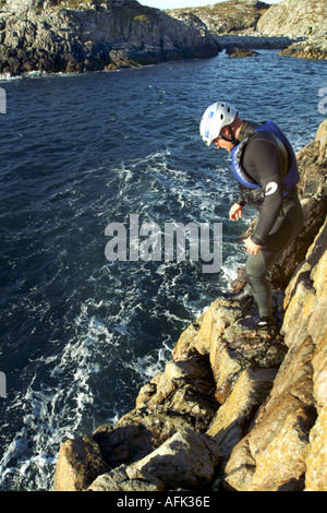 Cliff jumping in Tiree Scotland Scottish isles Hebridean Isles Hebrides ...