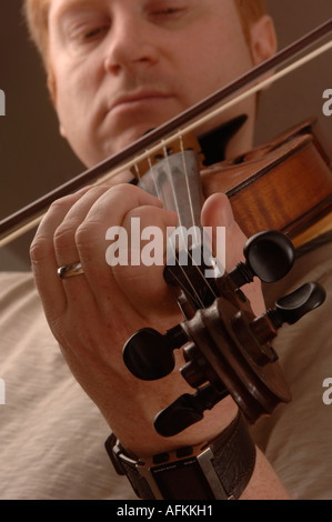 welsh folk music - man playing violin fiddle Stock Photo - Alamy