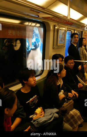 People in metro train Stock Photo - Alamy