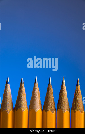 Line up of standard yellow freshly sharpened pencils Stock Photo - Alamy