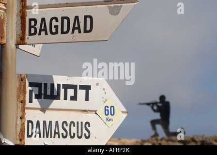 A signpost directing to Damascus with metal figure depicting soldier in ...