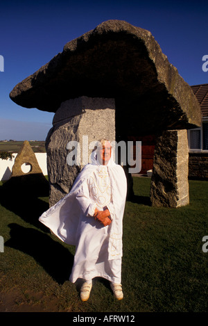 Ed Prynn, an eccentric druid in his Megalithic Garden, with copies ...