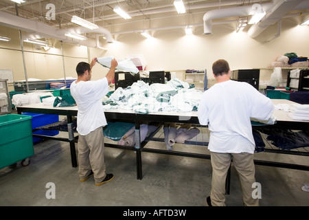 Inmates working in the laundry. Maximum security prison, Nebraska, USA ...